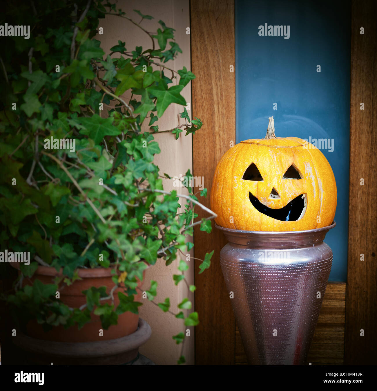Halloween Pumpkin outside the house entrance in italy Stock Photo - Alamy