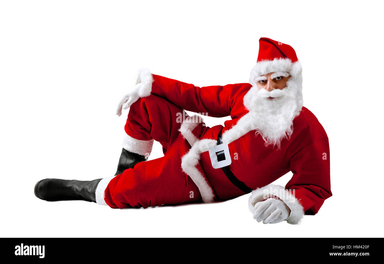 Santa Claus lying comfortably on a white background Stock Photo - Alamy