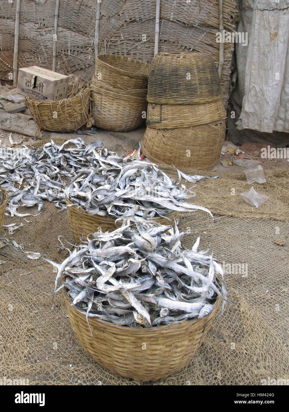 Dried fish in basket Stock Photo - Alamy
