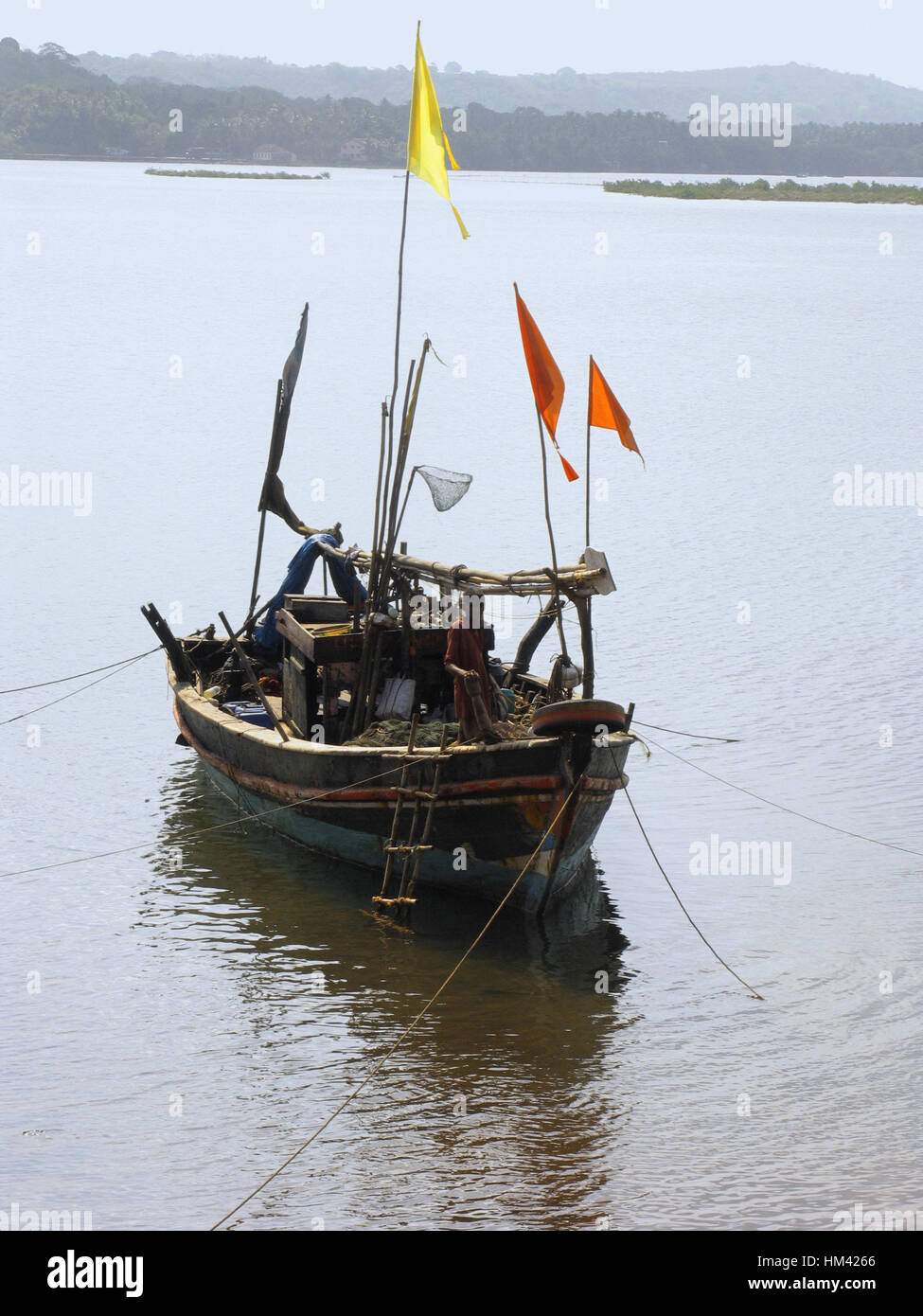 A small boat on a river Stock Photo - Alamy