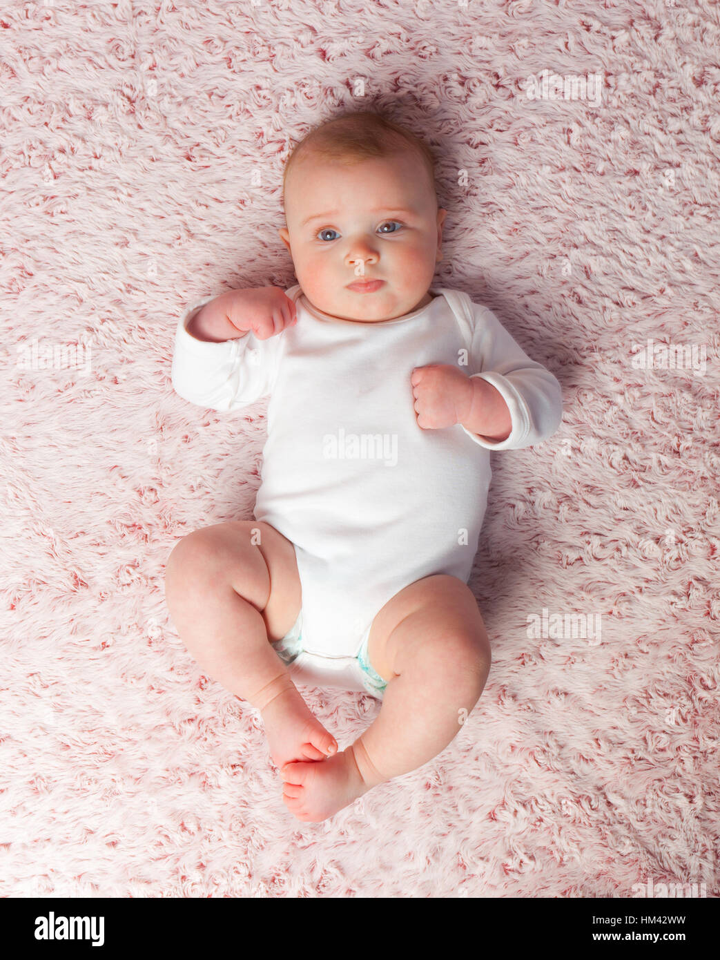 Baby laying top view hi-res stock photography and images - Alamy