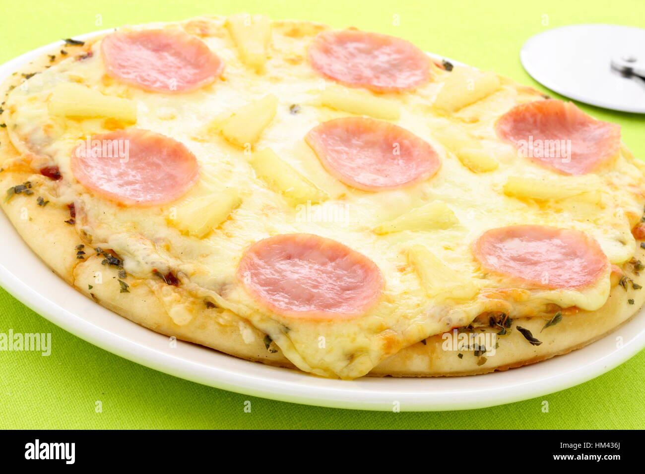 delicious hawaiian rustic style pizza made with fresh pineapples,ham ...