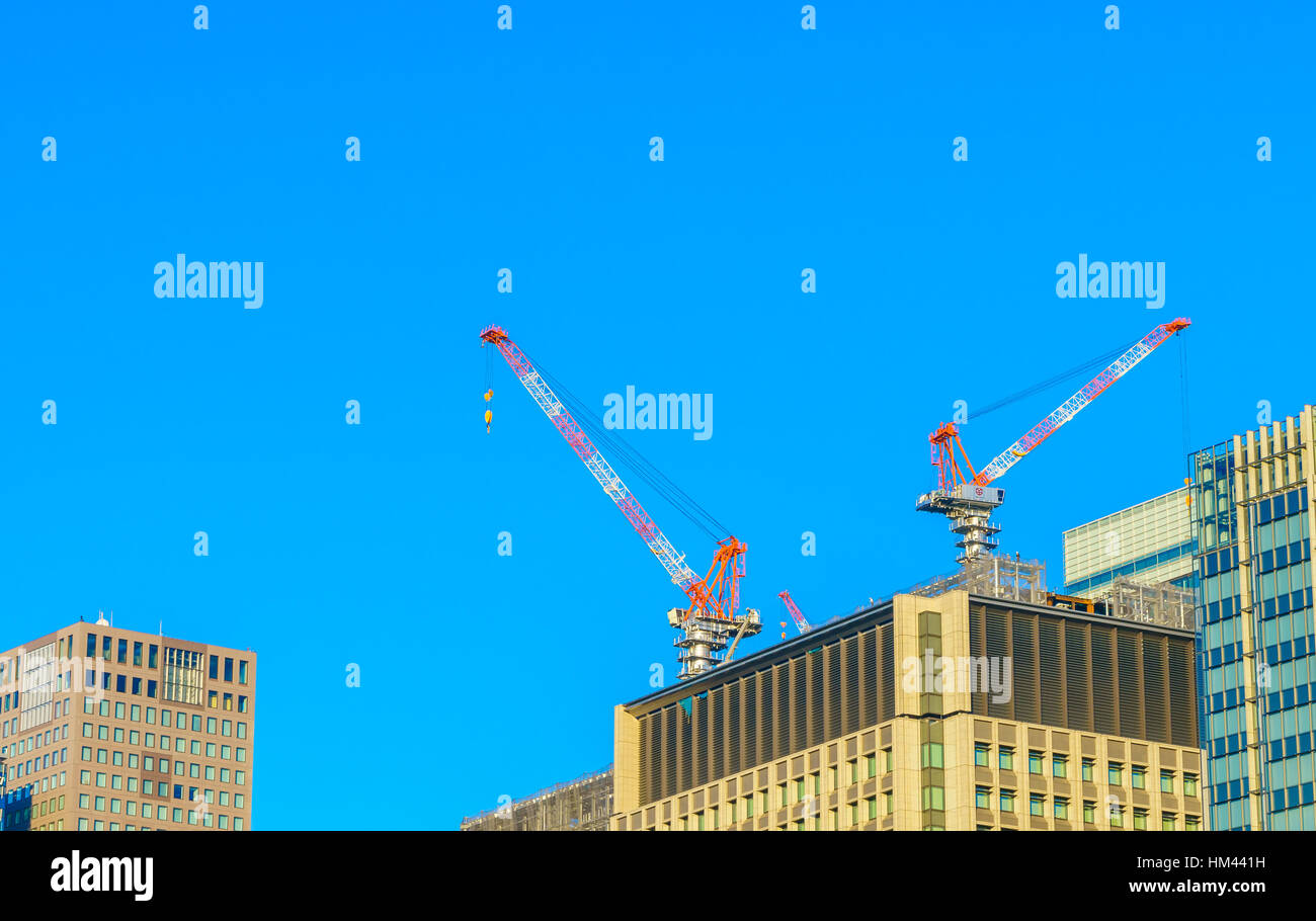 Crane and building construction site Stock Photo - Alamy