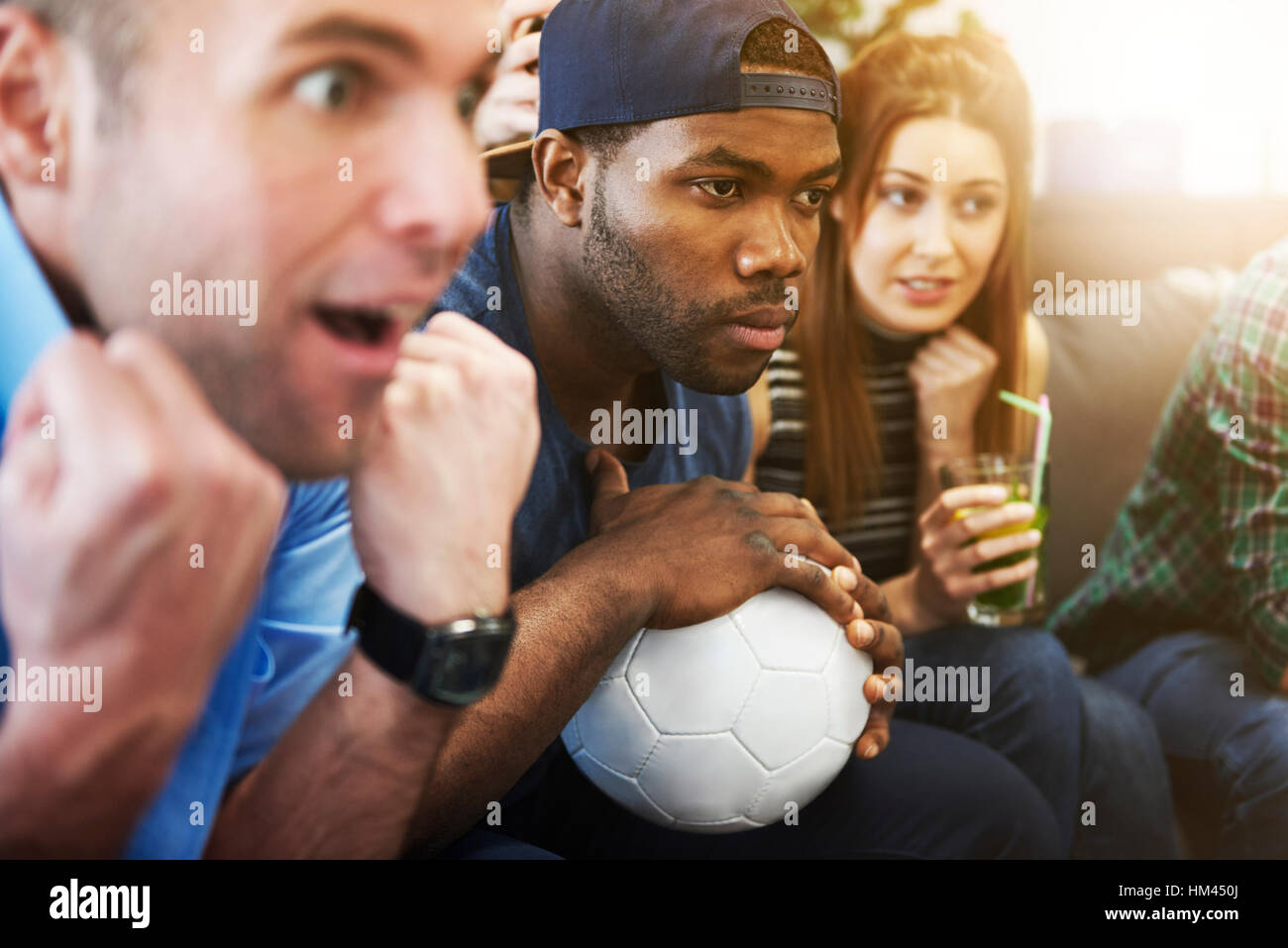Spectators waiting with bated breath Stock Photo - Alamy