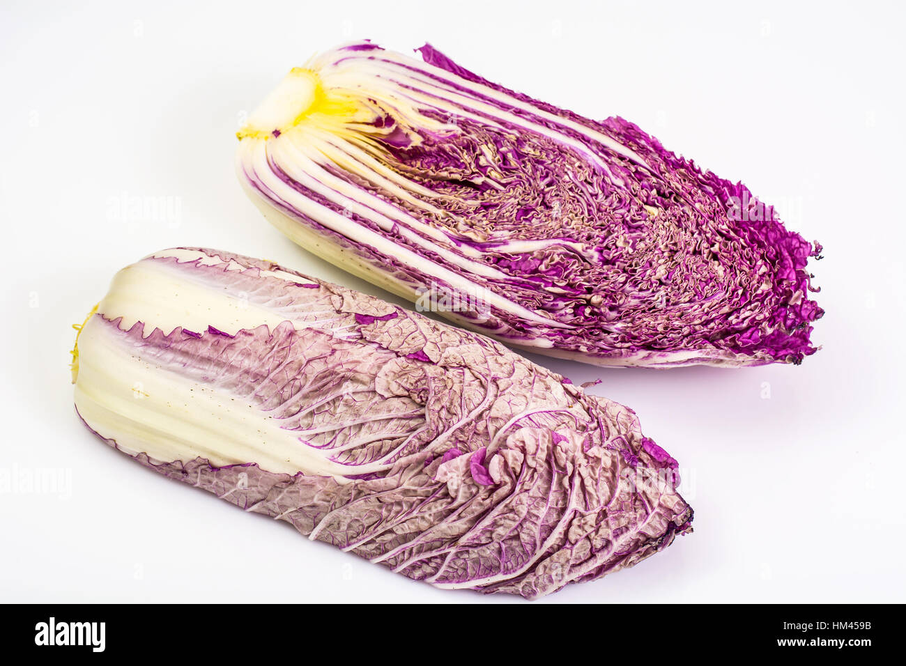 Red Chinese cabbage on a light background Stock Photo - Alamy
