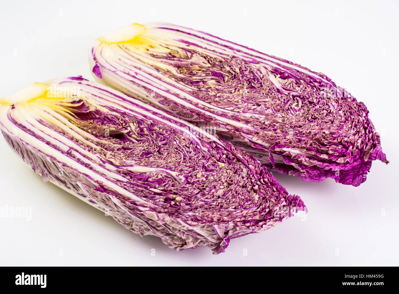 Red Chinese cabbage on a light background Stock Photo - Alamy