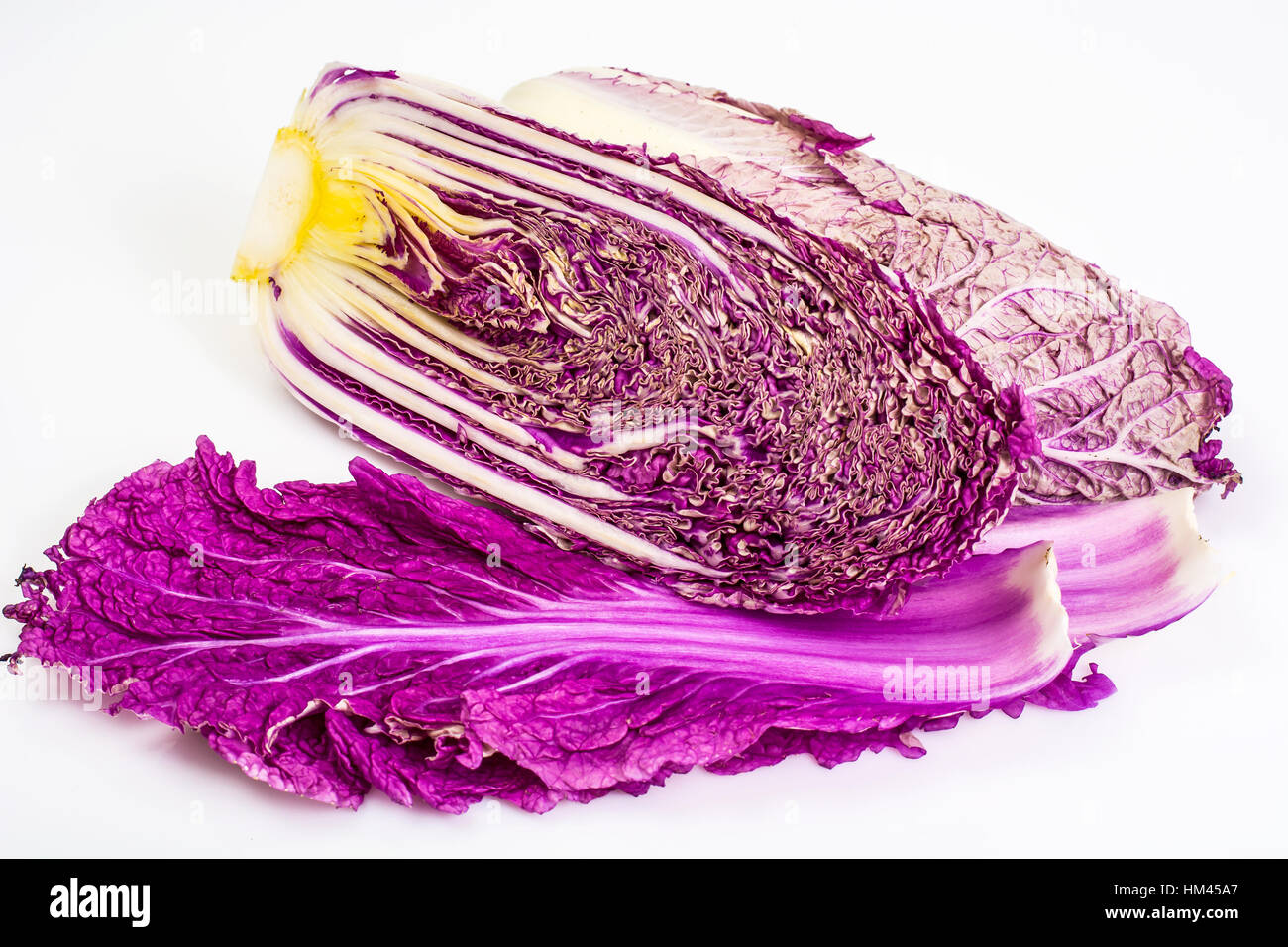 Red Chinese cabbage on a light background Stock Photo - Alamy