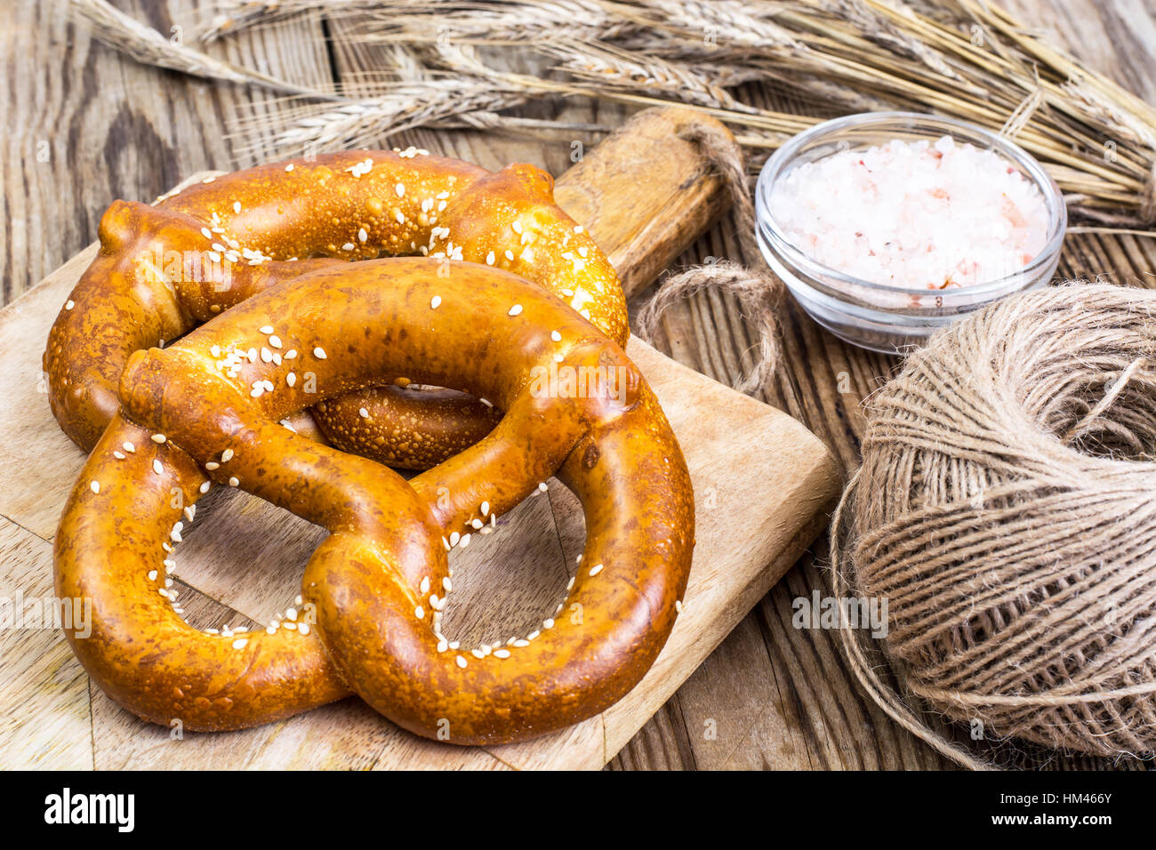 Fresh salty German bread: pretzels on a background of old boards Stock ...