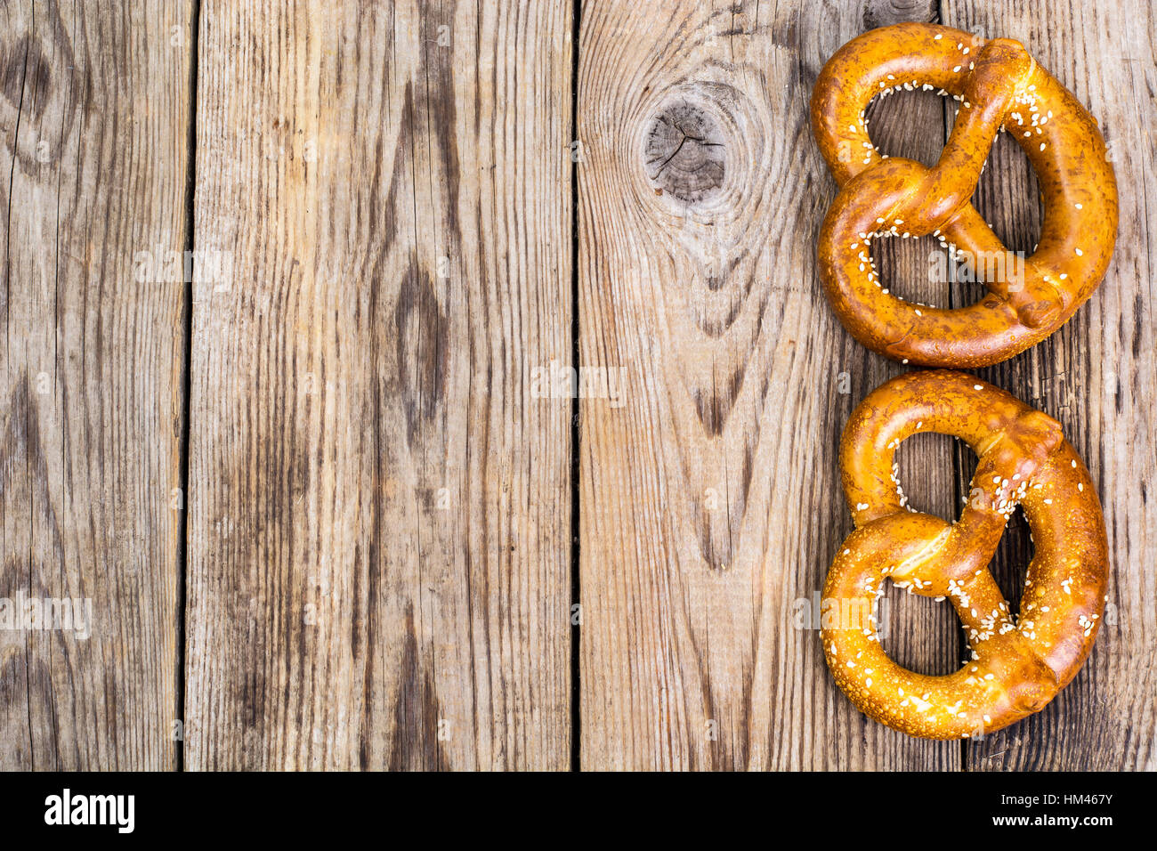Fresh salty German bread: pretzels on a background of old boards Stock ...