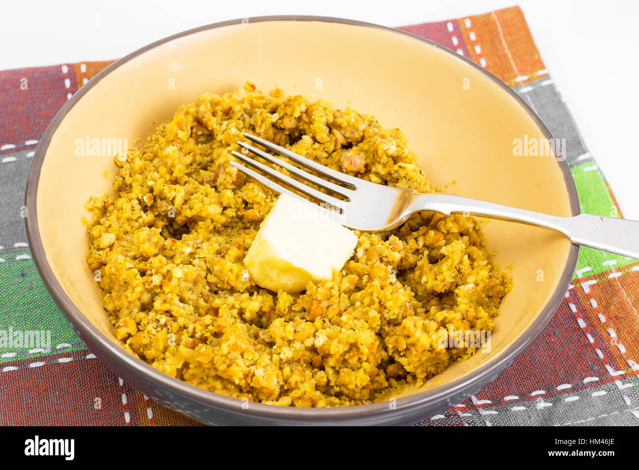 Lentil porridge with butter in a ceramic bowl on a white backgro Stock ...