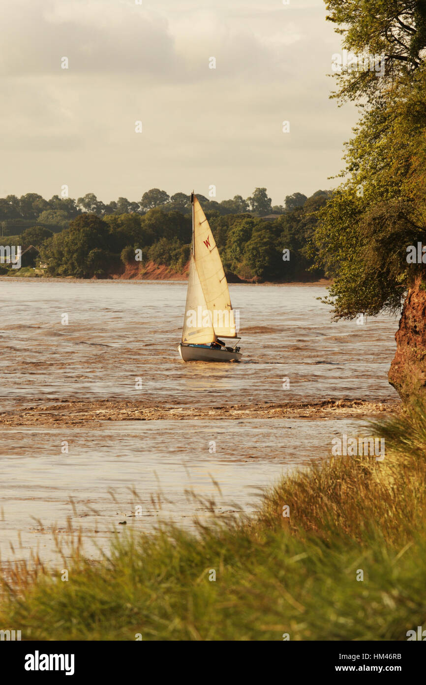 Small sailing boats riding the Severn Bore wave, River Severn, Newnham ...