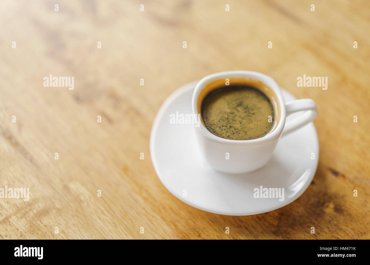 Espresso Coffee cup on wood table Stock Photo - Alamy