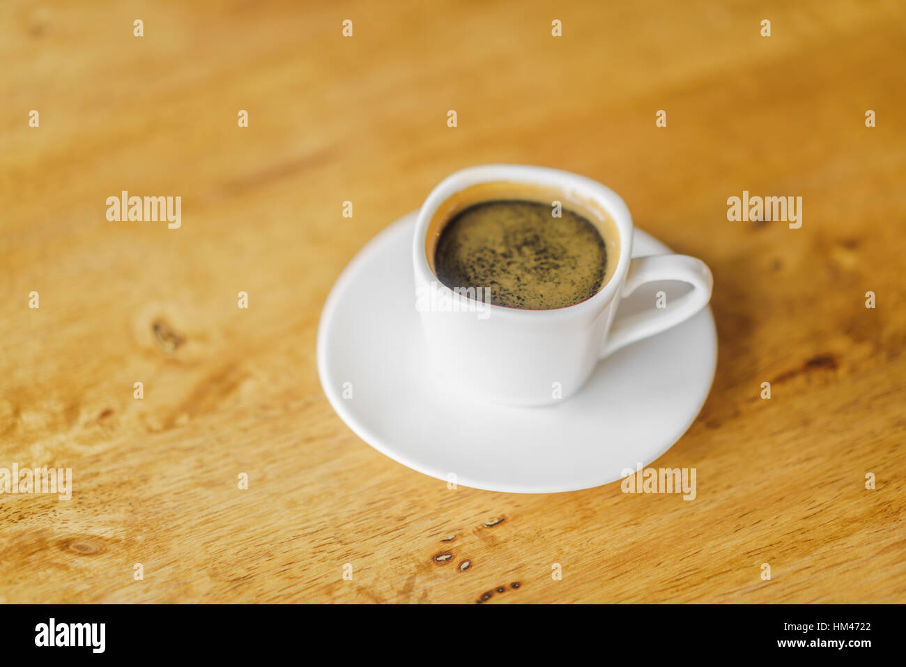 Espresso Coffee cup on wood table Stock Photo - Alamy