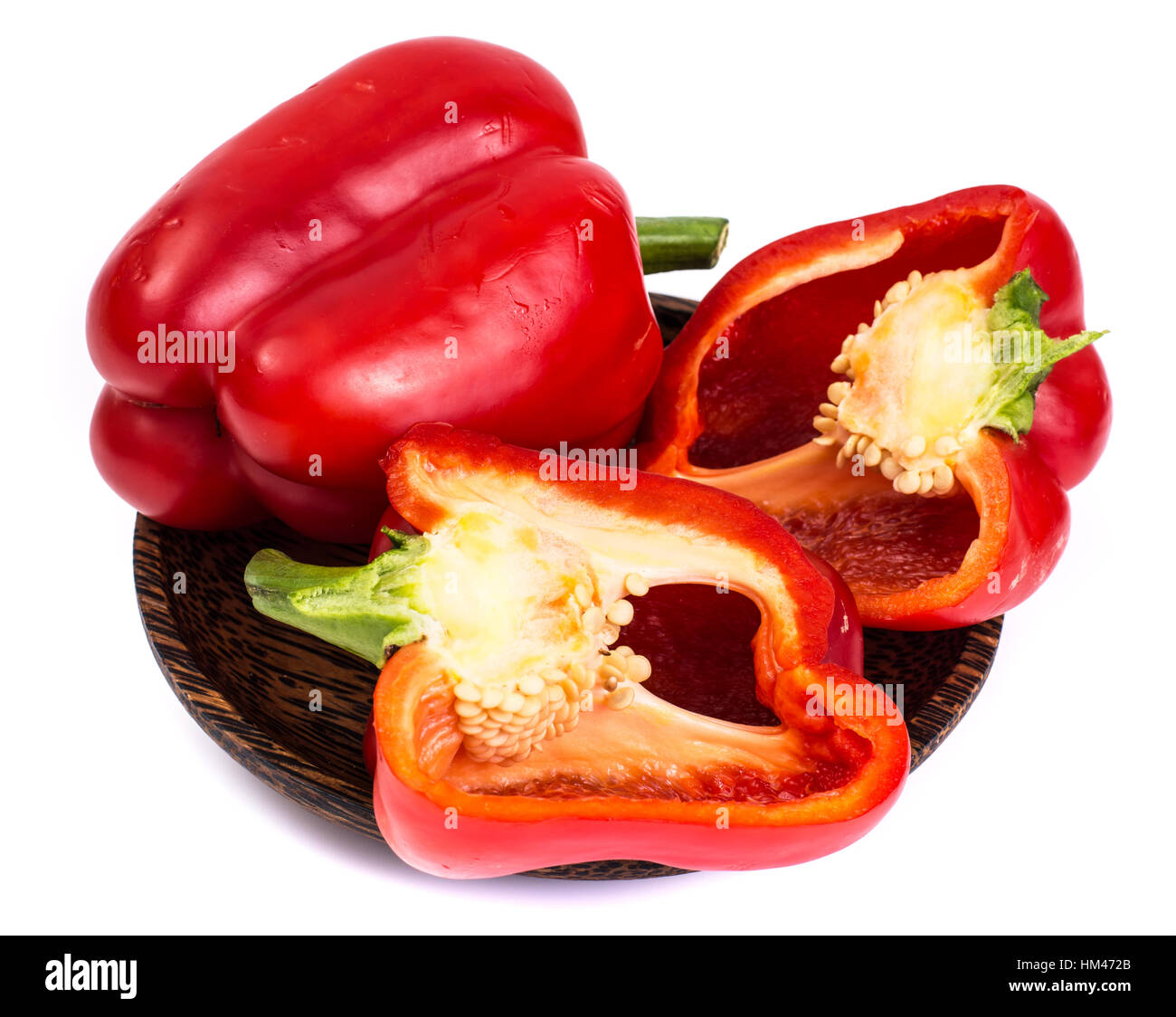 Red bell pepper in cut with seeds Stock Photo - Alamy