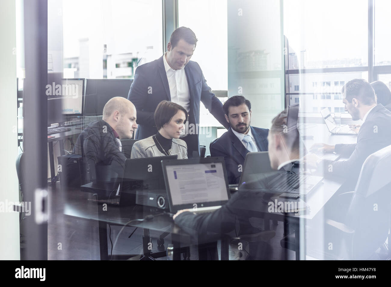 Woman smile seen working hi-res stock photography and images - Alamy
