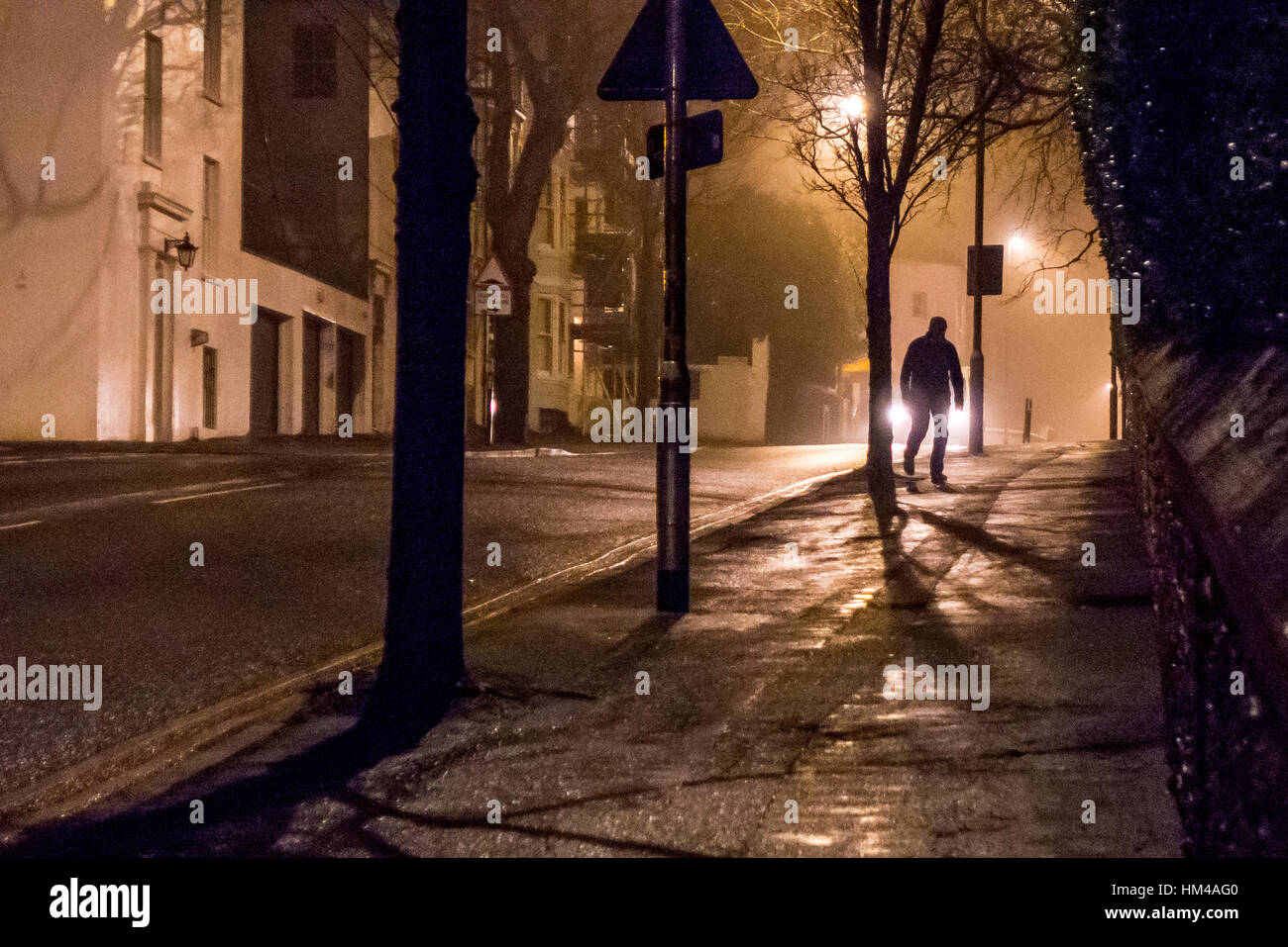 Man Walking Alone At Night