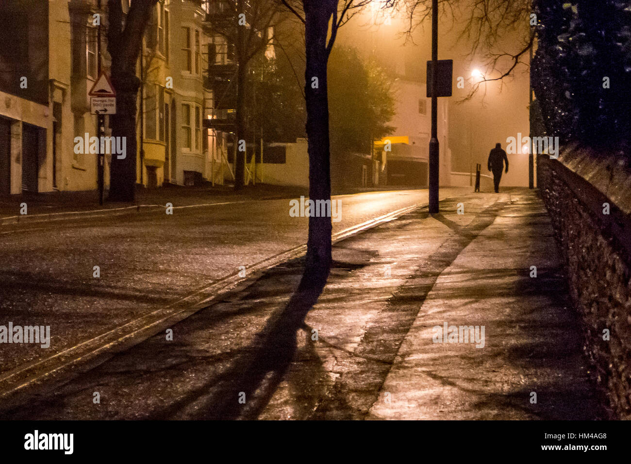 Man Walking Alone At Night