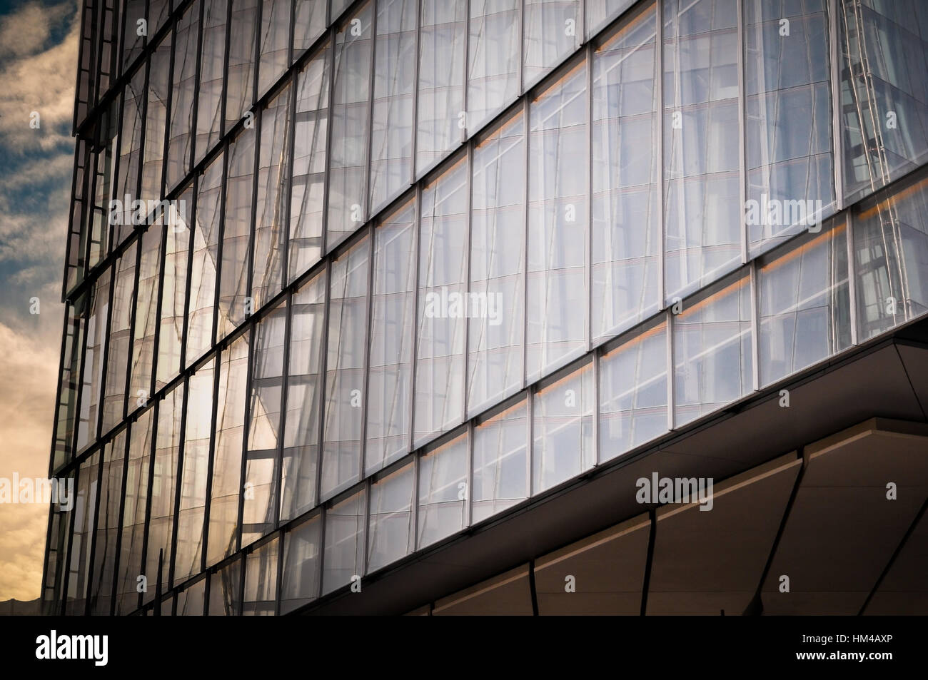 City office buildings with architecture detail in windows Stock Photo ...