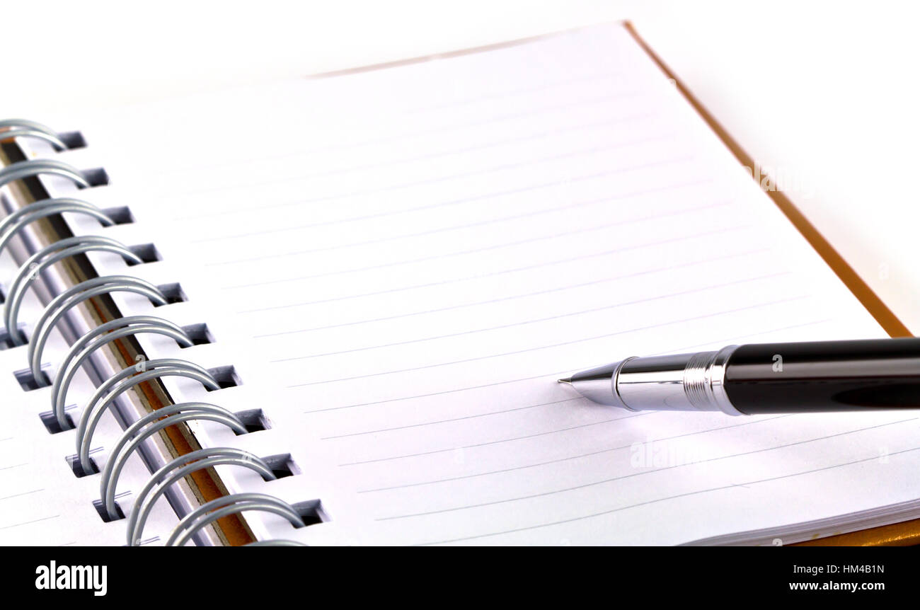 Open note book with pen Stock Photo - Alamy