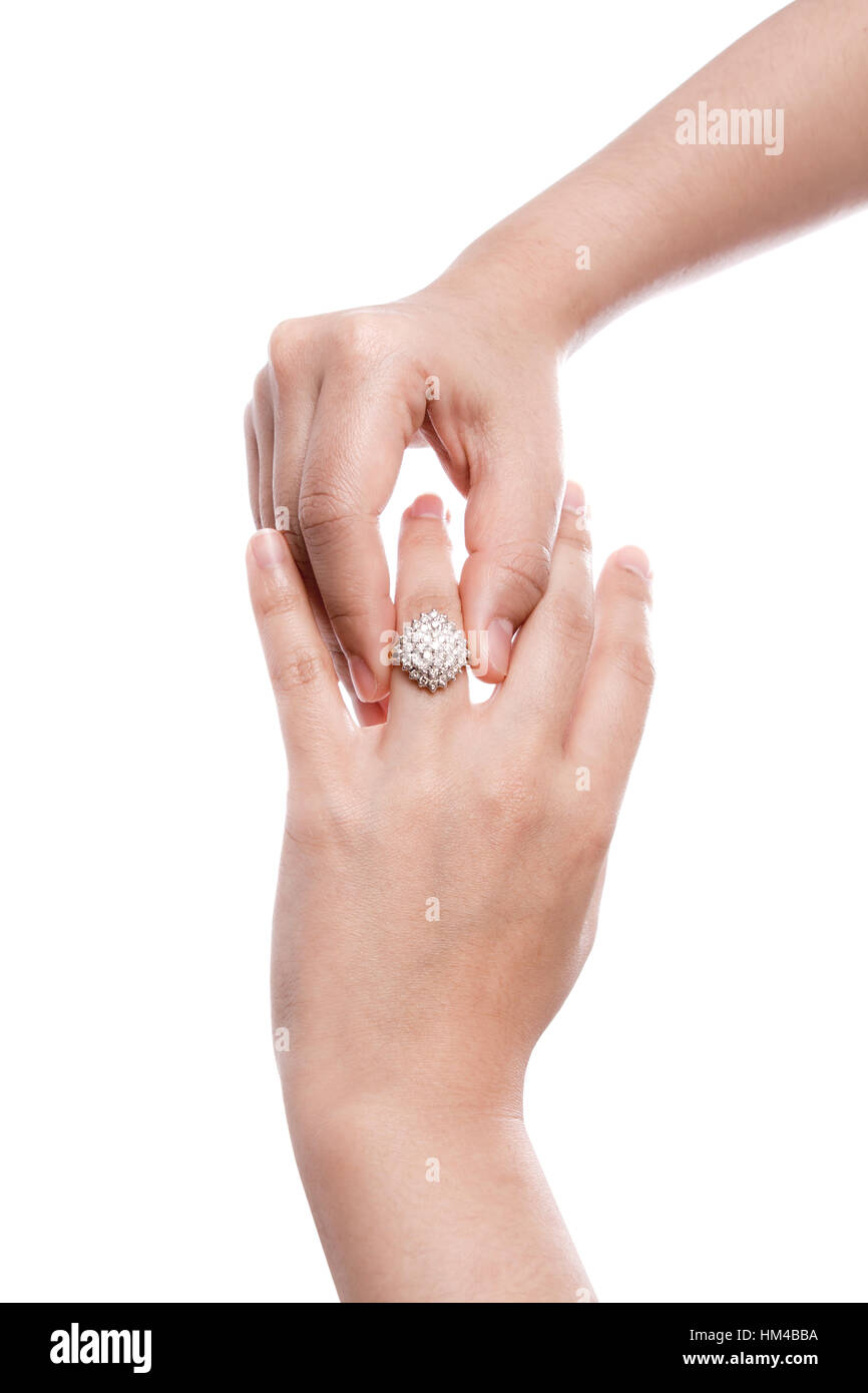 Engagement Ring in hand isolate on white background Stock Photo - Alamy