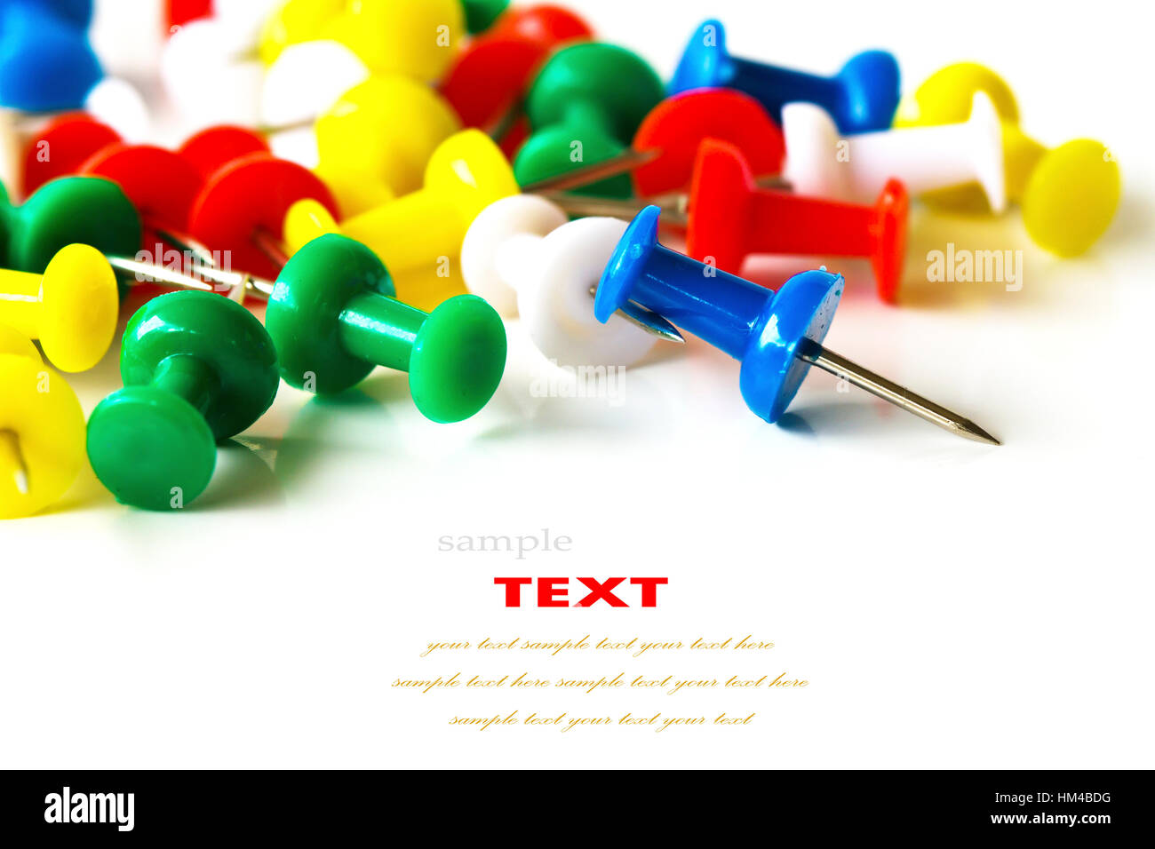 Group of colorful push pins on white background Stock Photo - Alamy