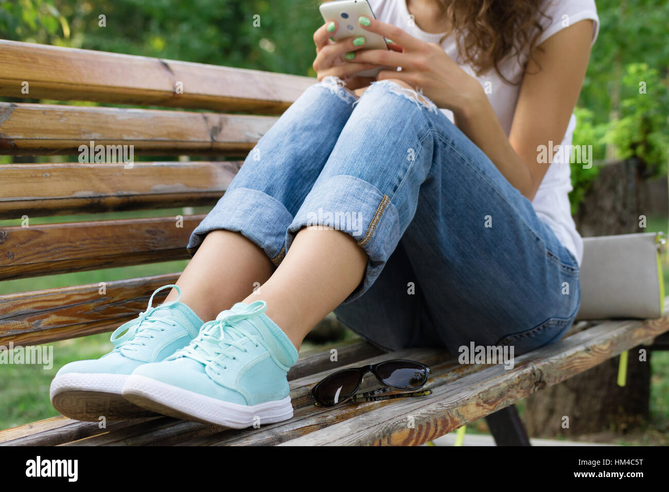 Girl mobile phone feet hi-res stock photography and images - Alamy
