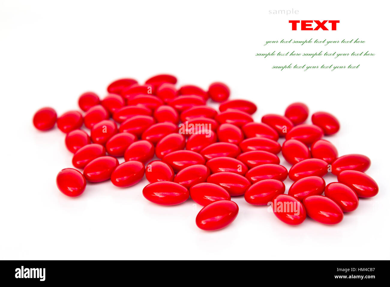 Red medicinal pills on a white background with space for text Stock ...