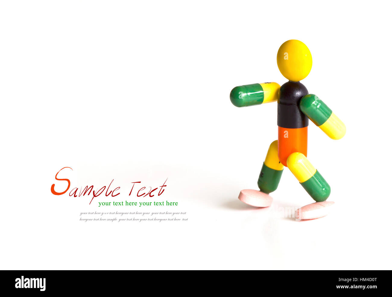 Robot (made of capsules and tablets) walking on white background with ...