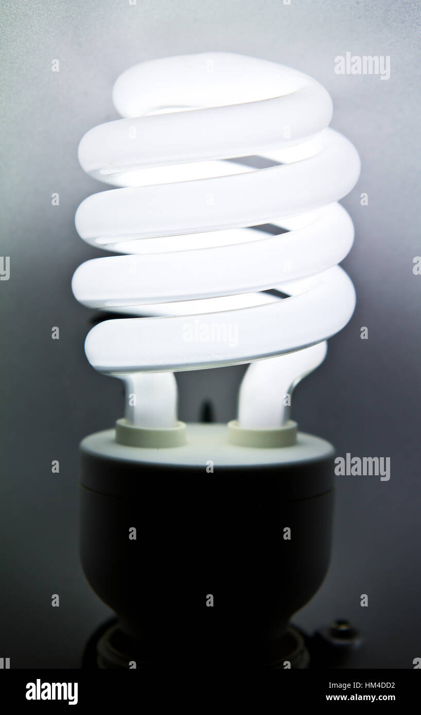 bright energy saving fluorescent light bulb Stock Photo - Alamy