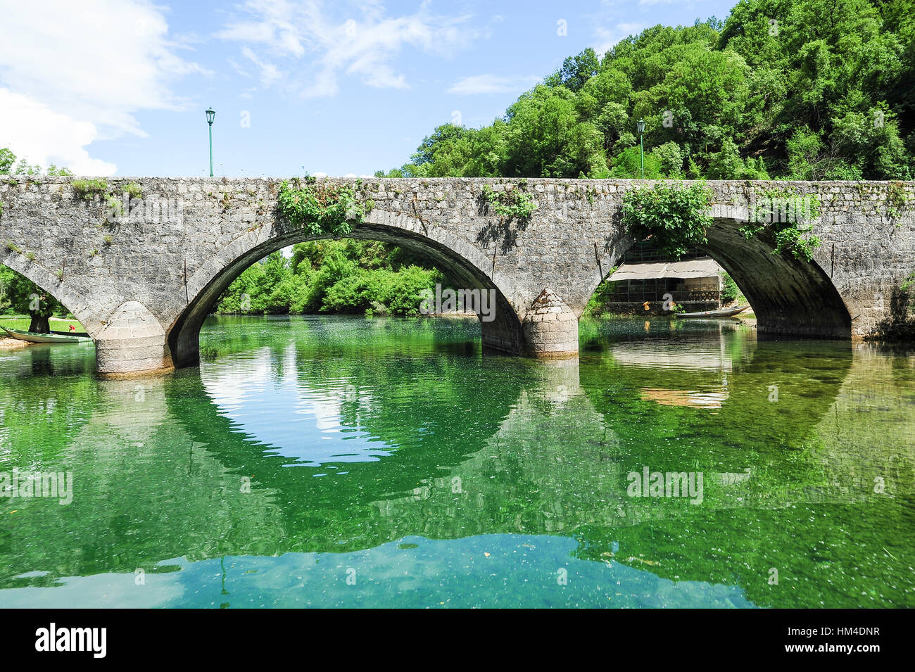 The old arched stone bridge of Rijeka Crnojevica on Montenegro Stock Photo - Alamy