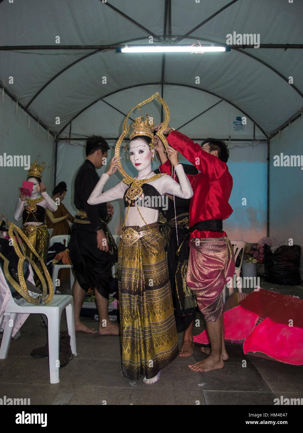 Backstage scene - Assistant helps traditional Thai Lakhon dancer with ...
