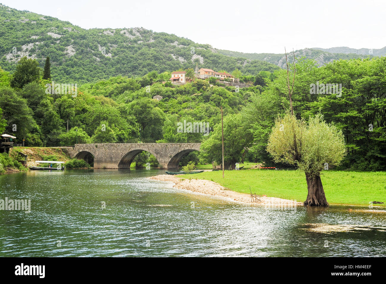 The old arched stone bridge of Rijeka Crnojevica on Montenegro Stock Photo - Alamy