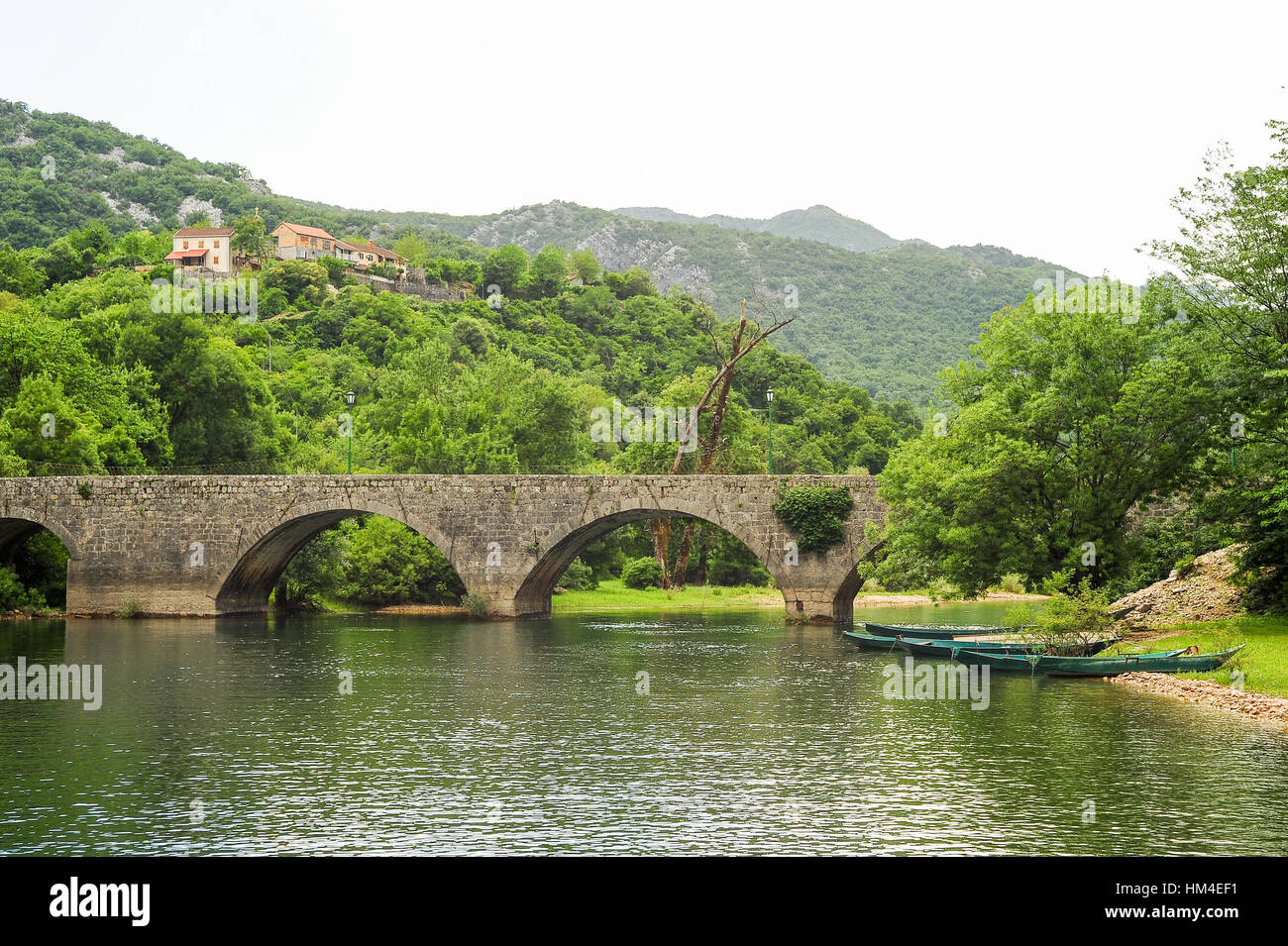 The old arched stone bridge of Rijeka Crnojevica on Montenegro Stock Photo - Alamy
