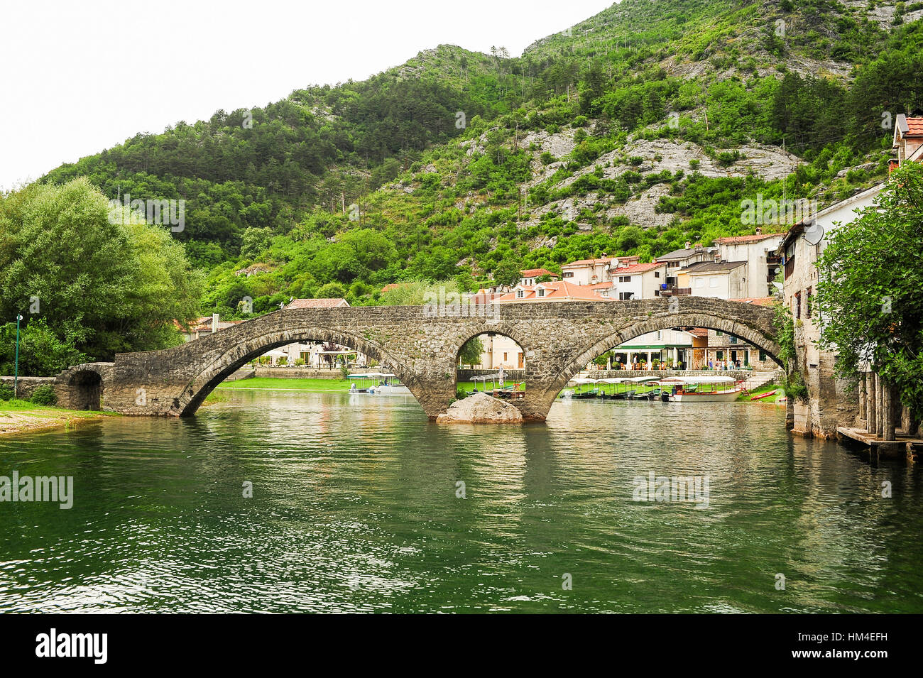 The old arched stone bridge of Rijeka Crnojevica on Montenegro Stock Photo - Alamy