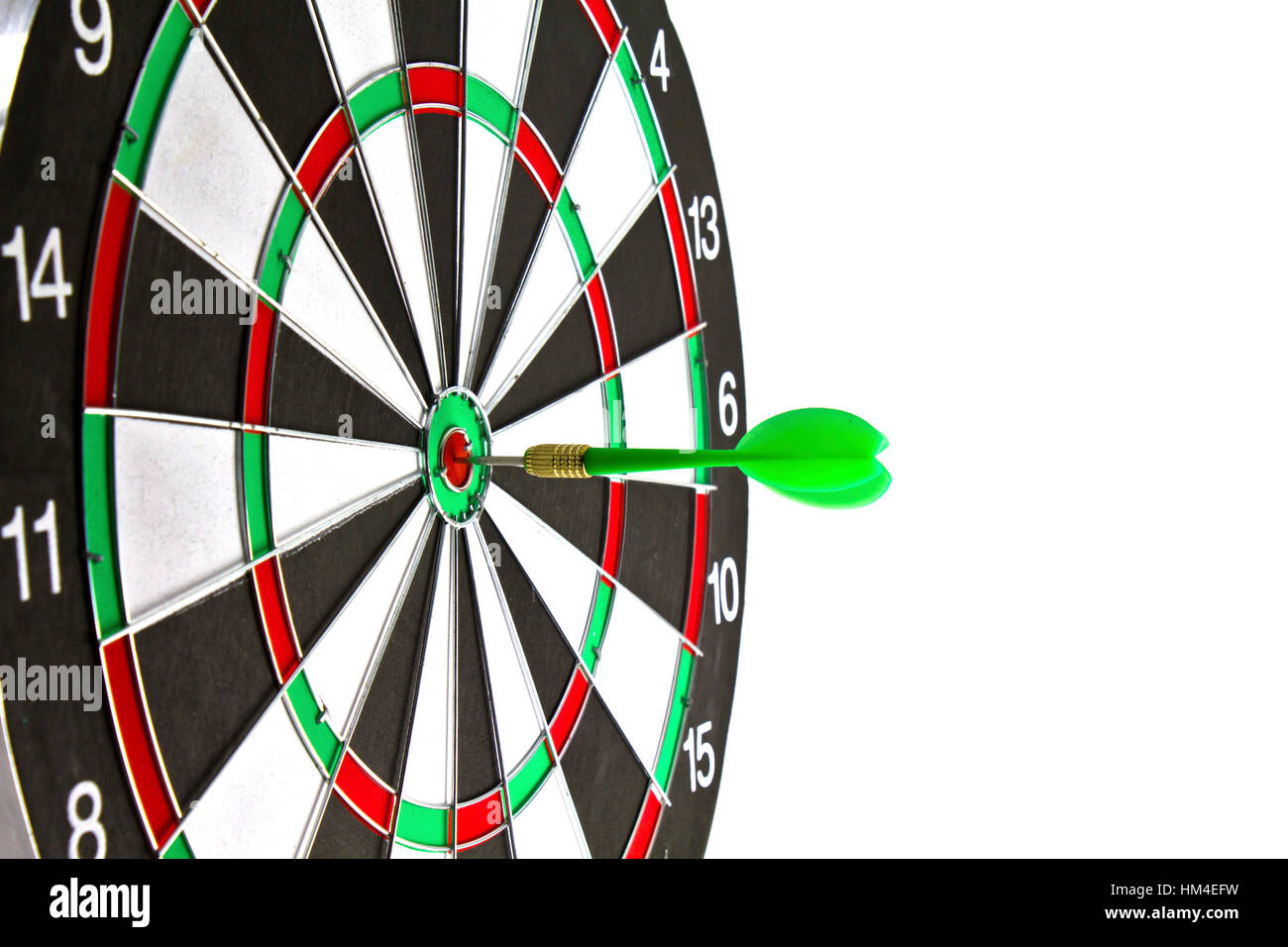 Dartboard with dart on white background Stock Photo - Alamy