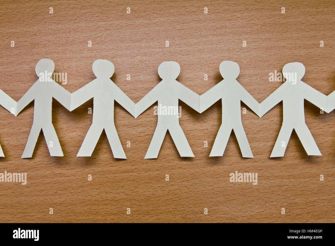 Cutout paper people Stock Photo - Alamy