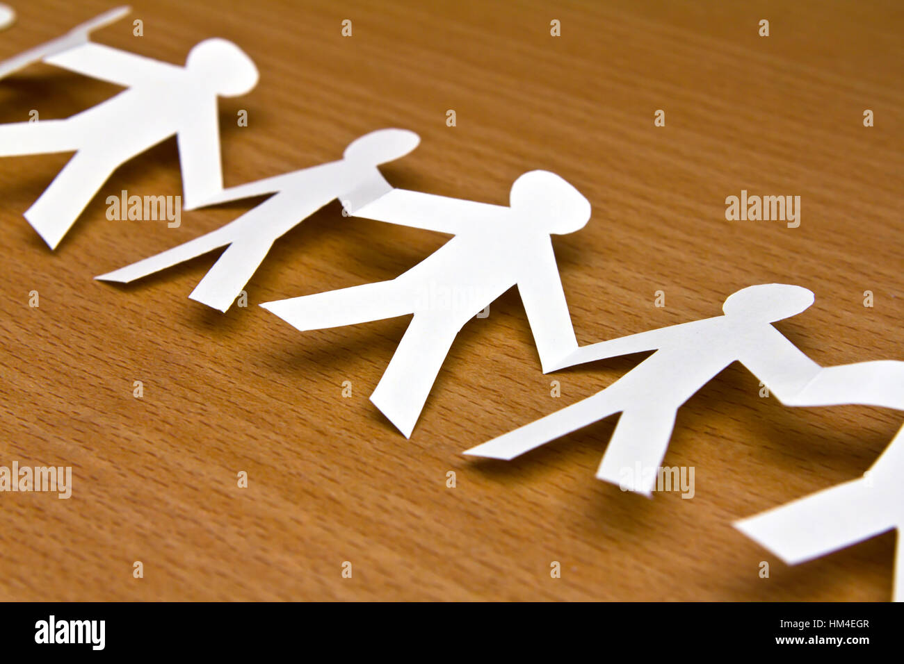 Cutout paper people Stock Photo - Alamy