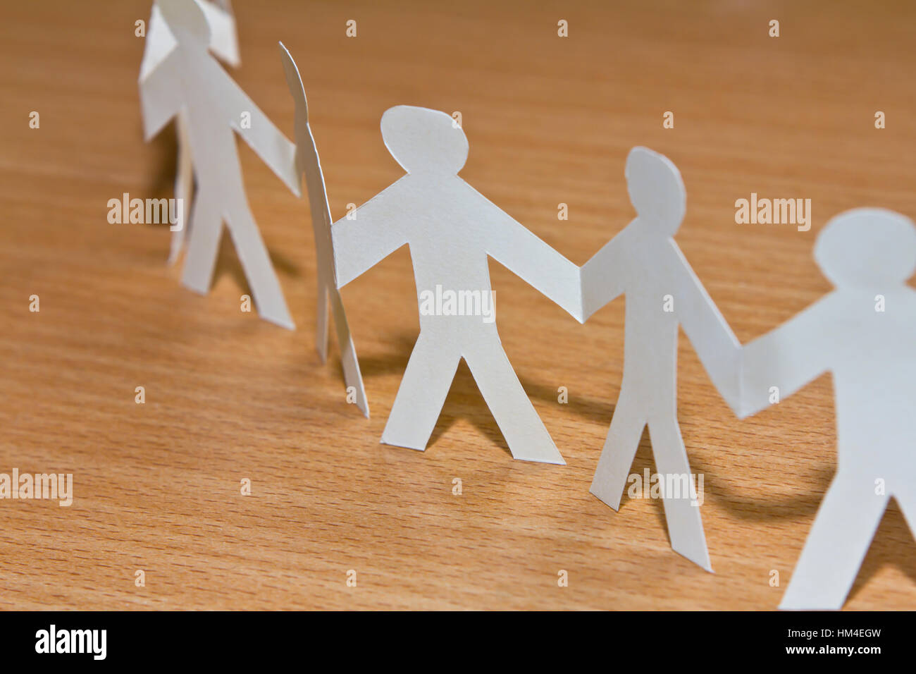 Cutout paper people Stock Photo - Alamy
