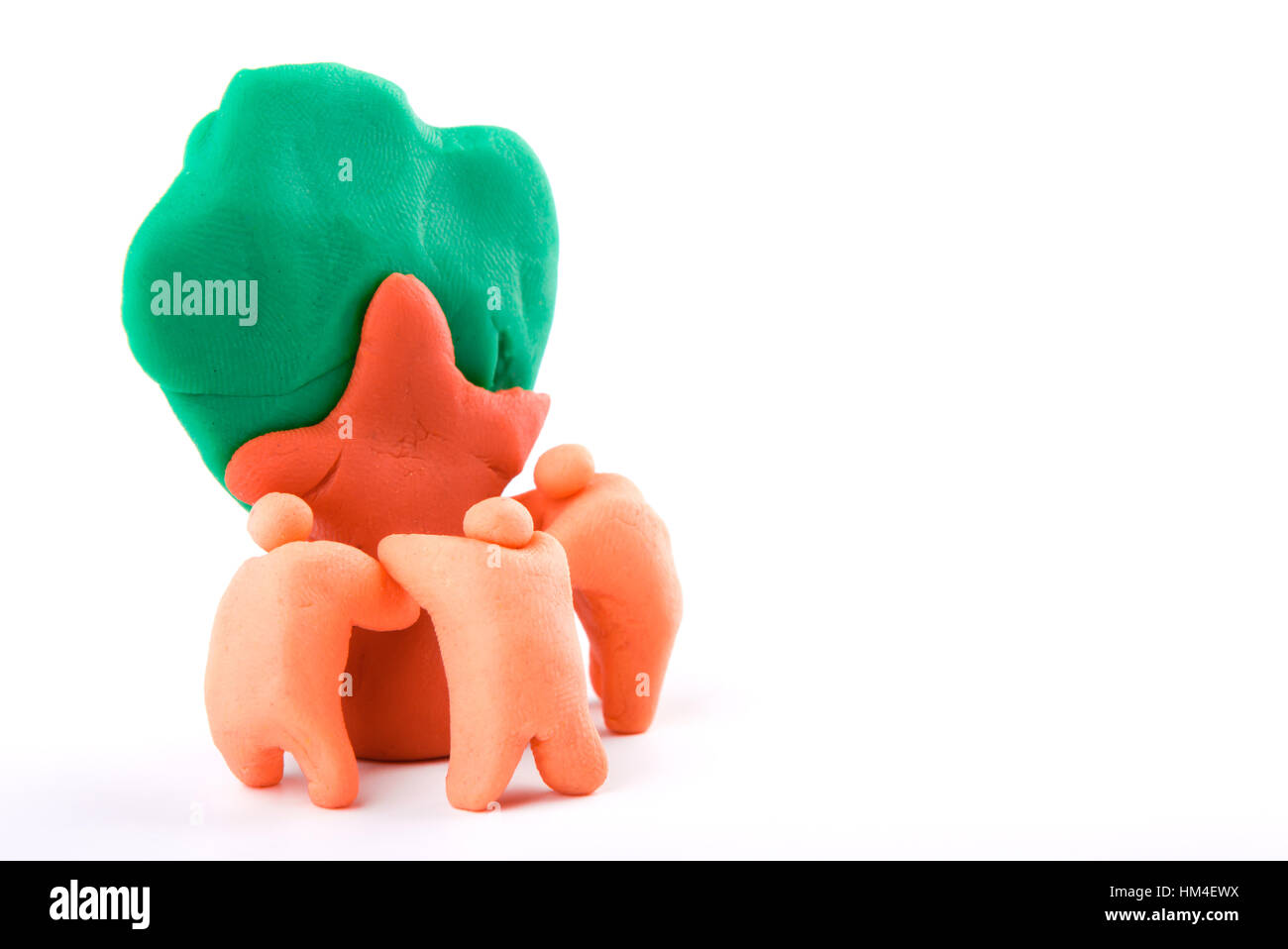 Plasticine of people embracing a tree Stock Photo - Alamy