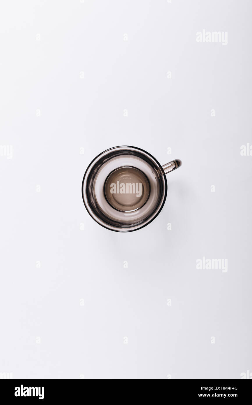Minimalistic image of the empty cup on white background, top view ...