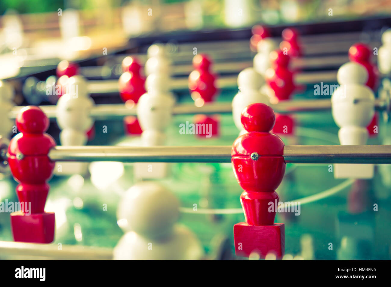 Football table game with red and white player ( Filtered image ...