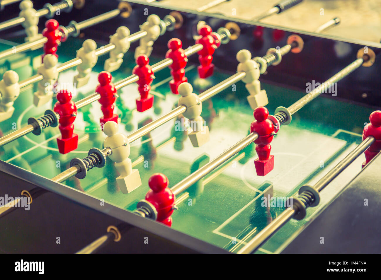 Football table game with red and white player ( Filtered image ...