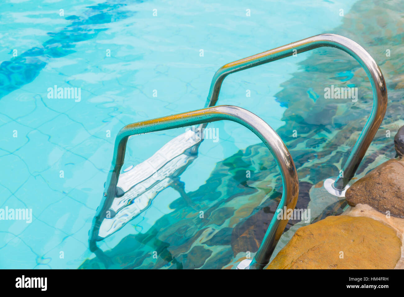 Swimming pool with stairs Stock Photo - Alamy