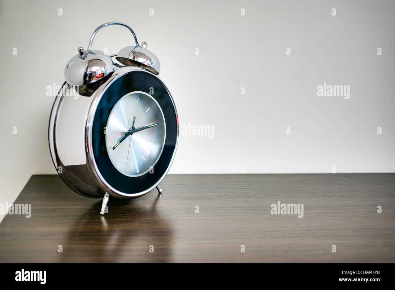 round clock face on the desk in the room Stock Photo - Alamy
