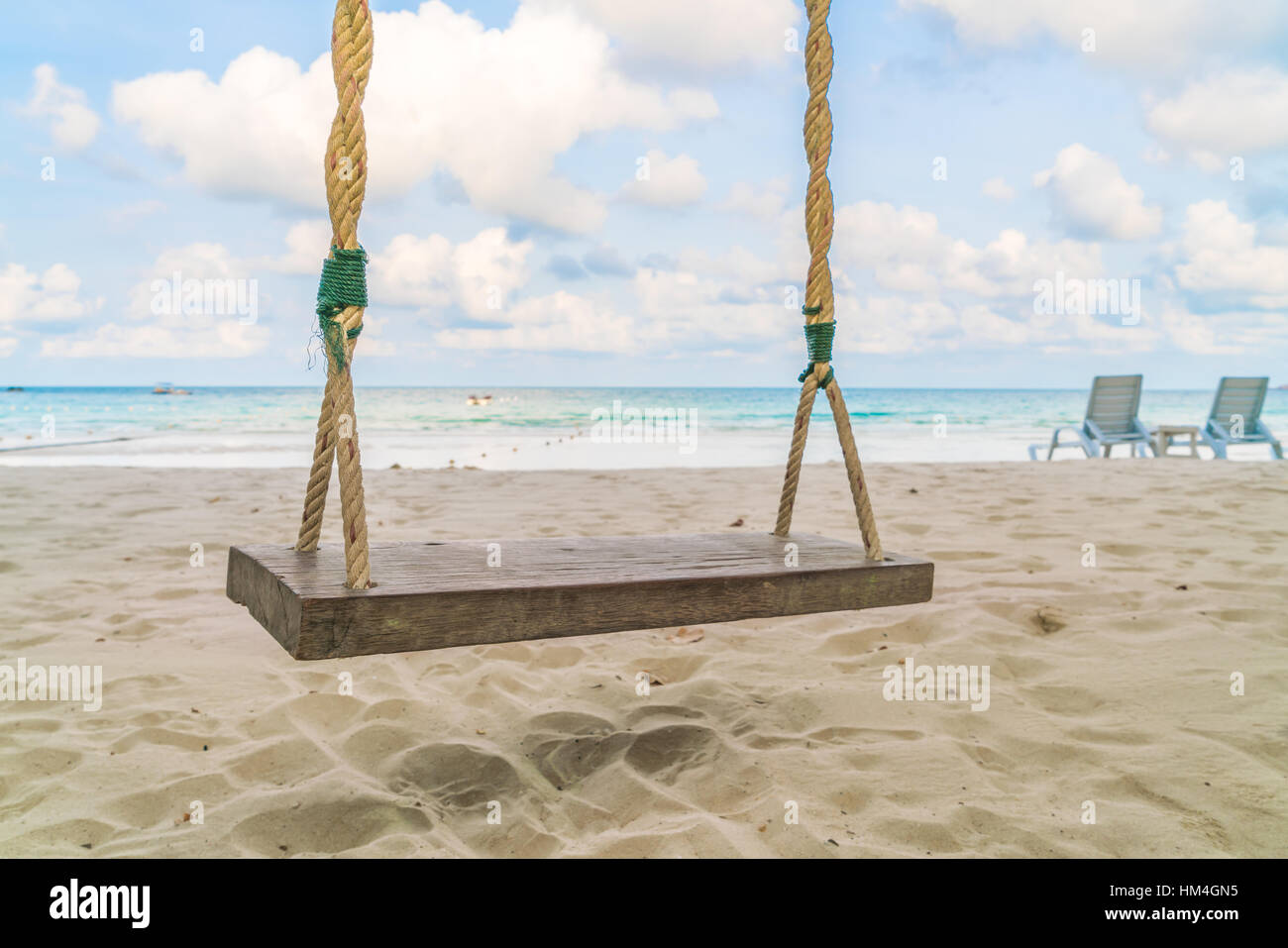 A swing on the beach Stock Photo - Alamy