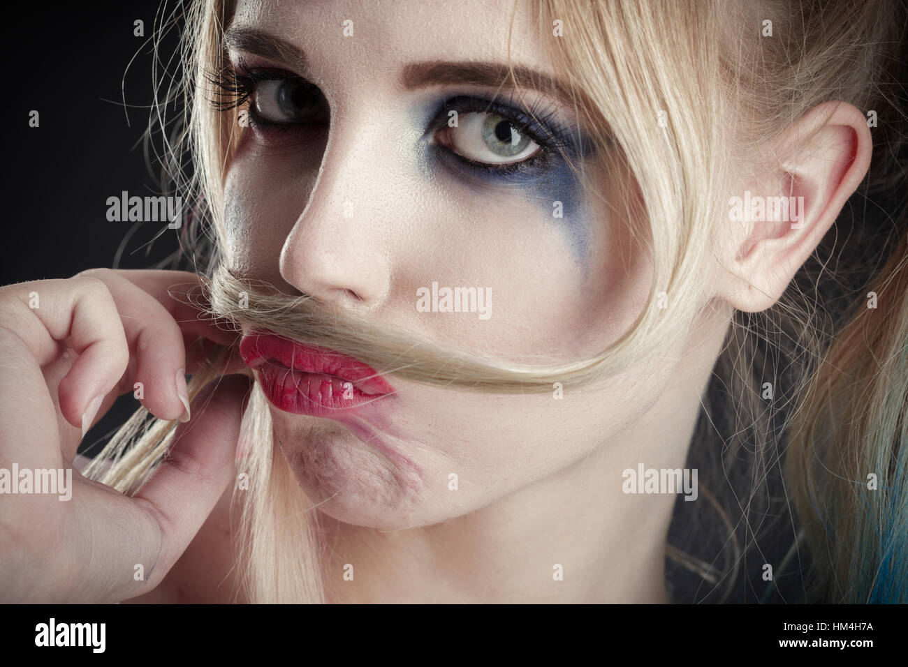 Pretty girl fake mustache hi-res stock photography and images - Alamy