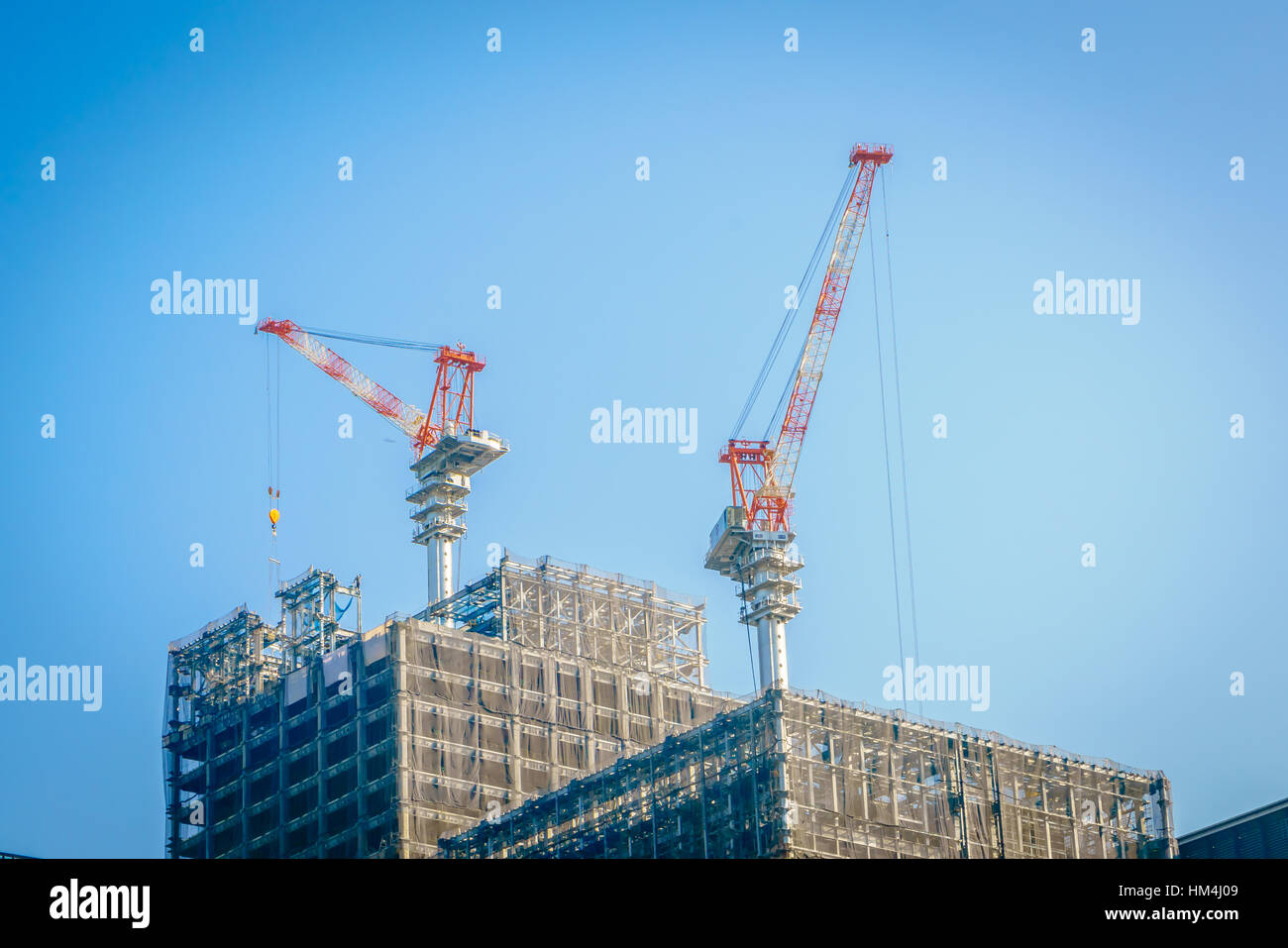 Crane and building construction site Stock Photo - Alamy