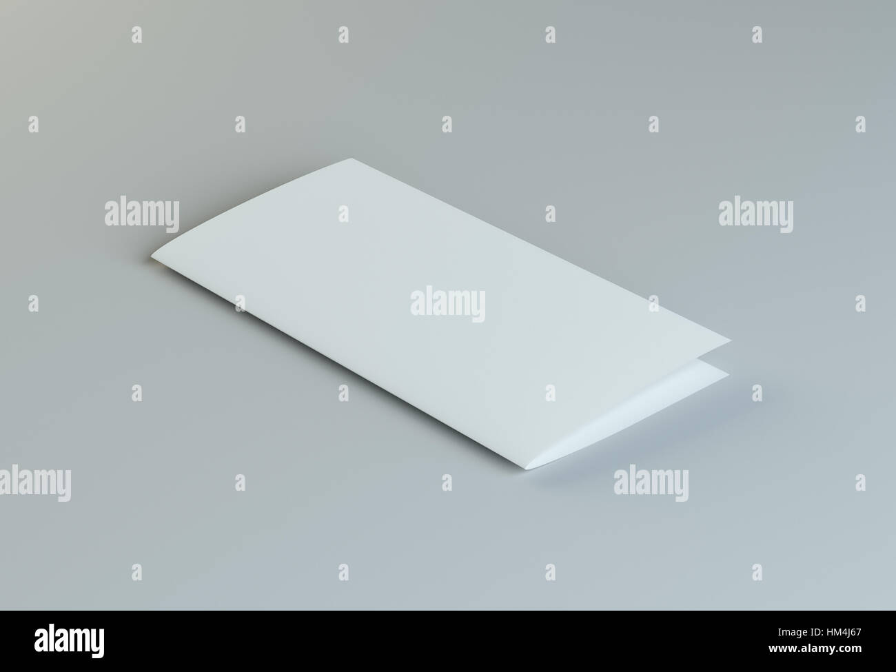 Lying blank two fold paper brochure Stock Photo - Alamy