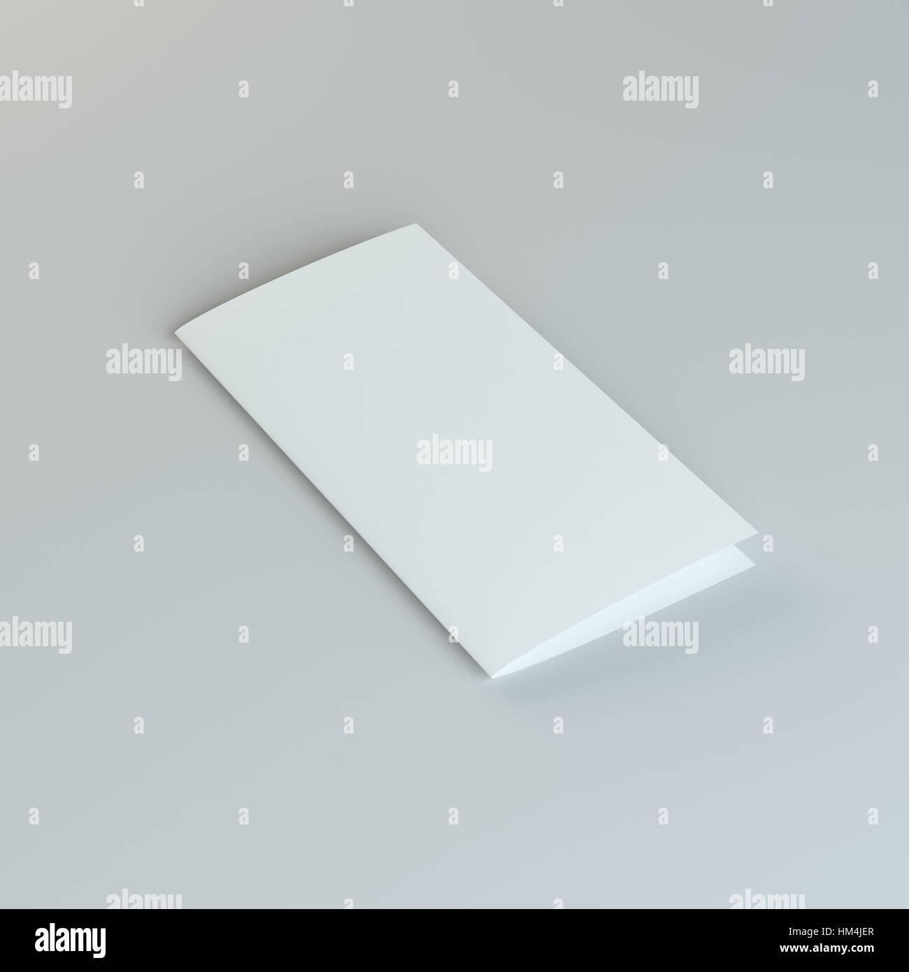 Lying blank two fold paper brochure Stock Photo - Alamy