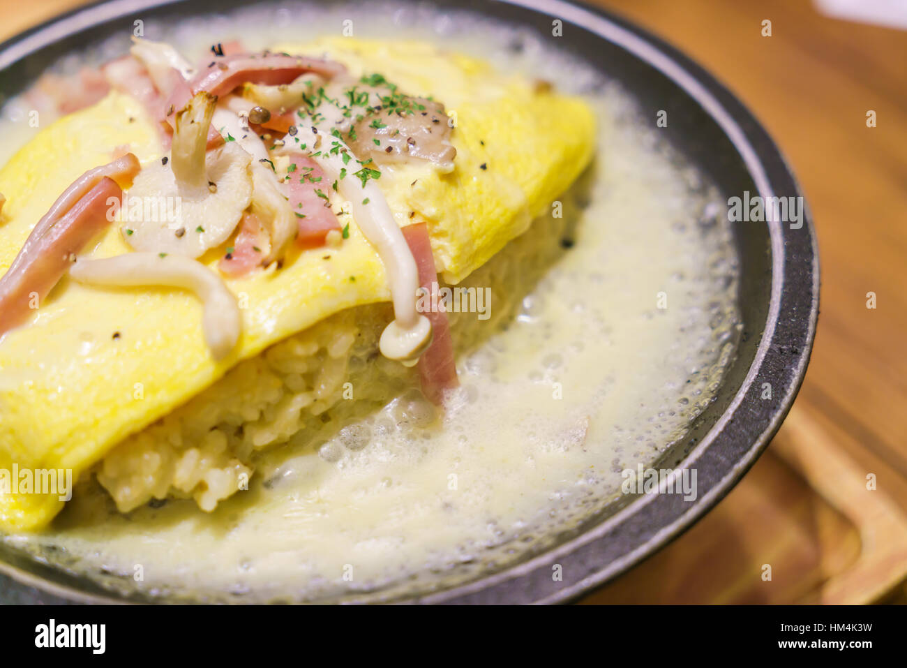 Rice with cheese omelet Stock Photo - Alamy